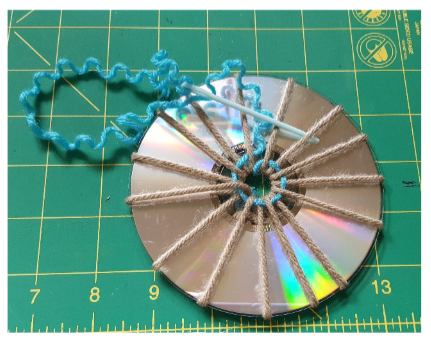 Upcycle CDs into Woven Coasters - The Cleveland Moms
