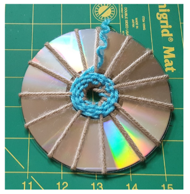 Upcycle CDs into Woven Coasters - The Cleveland Moms